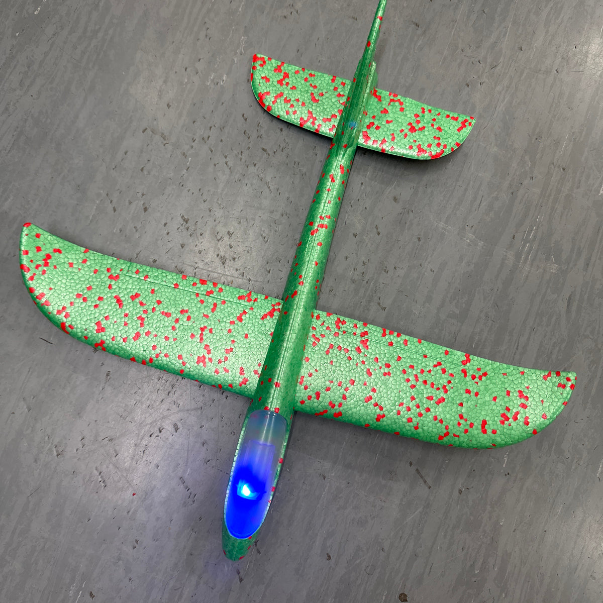 LED Hand Launch Glider in green with red dots lights activate on impac ...